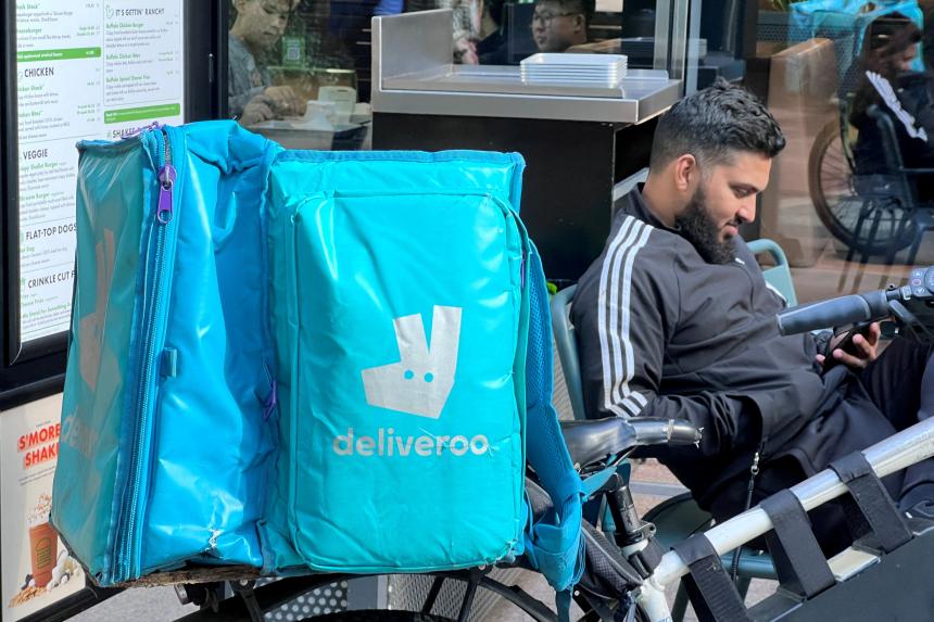 Deliveroo drivers denied union rights by UK top court | The Straits Times