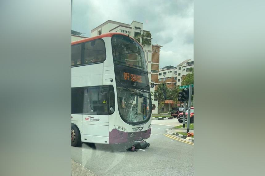 Motorcycle pinned under SBS Transit bus after accident | The Straits Times