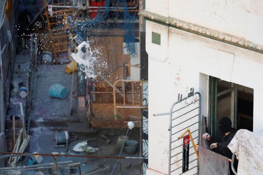 Police evict squatters from Barcelona buildings | The Straits Times