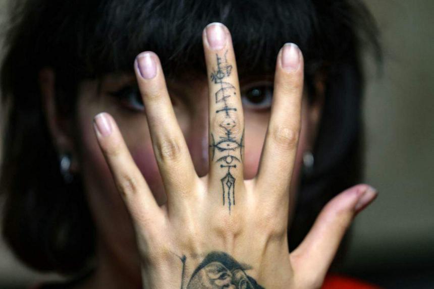 ‘Ink me up’: Iran tattoo artists aim to leave mark | The Straits Times