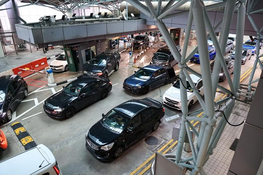 Motorist charged after his car allegedly dragged ICA officer at ...