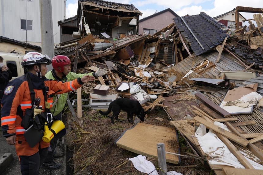 Woman in 90s pulled from rubble alive five days after Japan earthquake ...