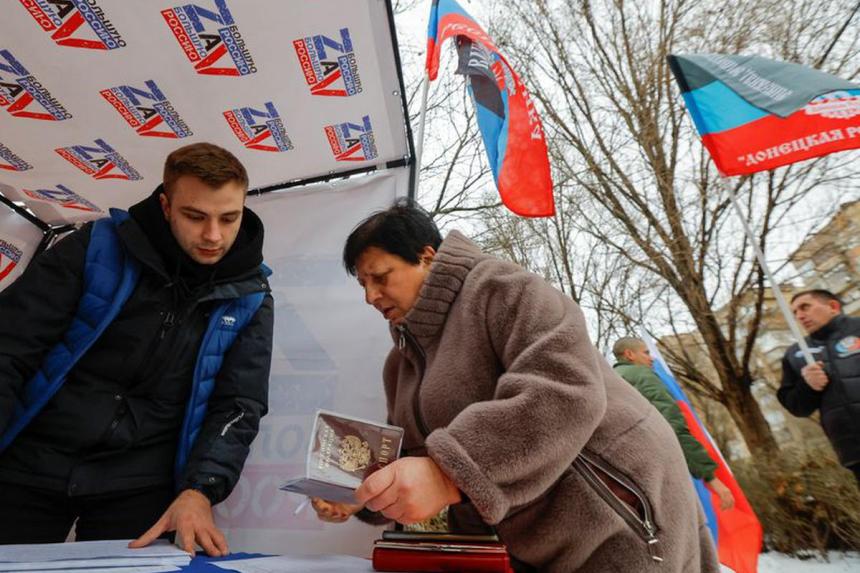 Putin gathers re-election signatures in Russian-held Ukraine | The ...