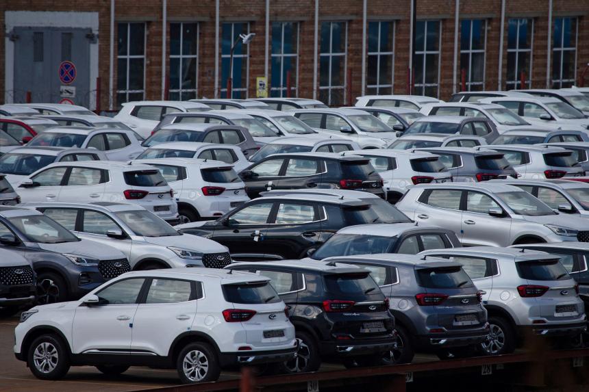 Car dealer’s collapse signals another bruising year for China market ...