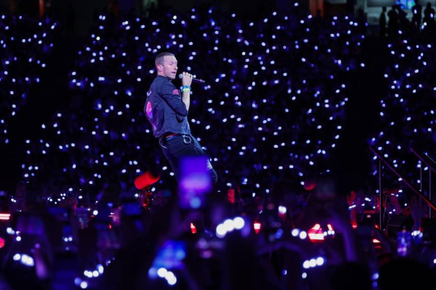 British band Coldplay light up National Stadium with kaleidoscopic ...