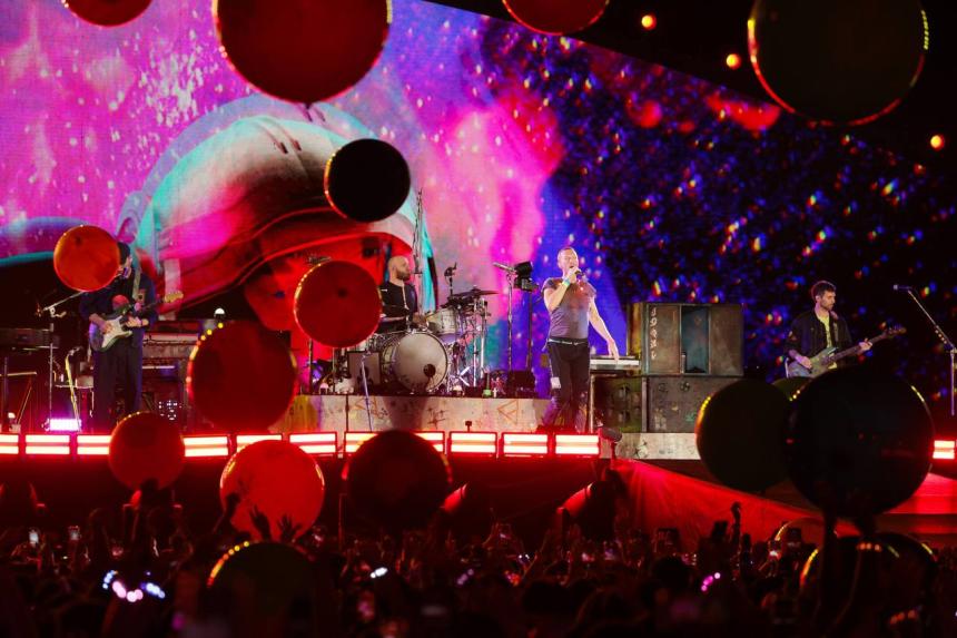 British band Coldplay light up National Stadium with kaleidoscopic ...