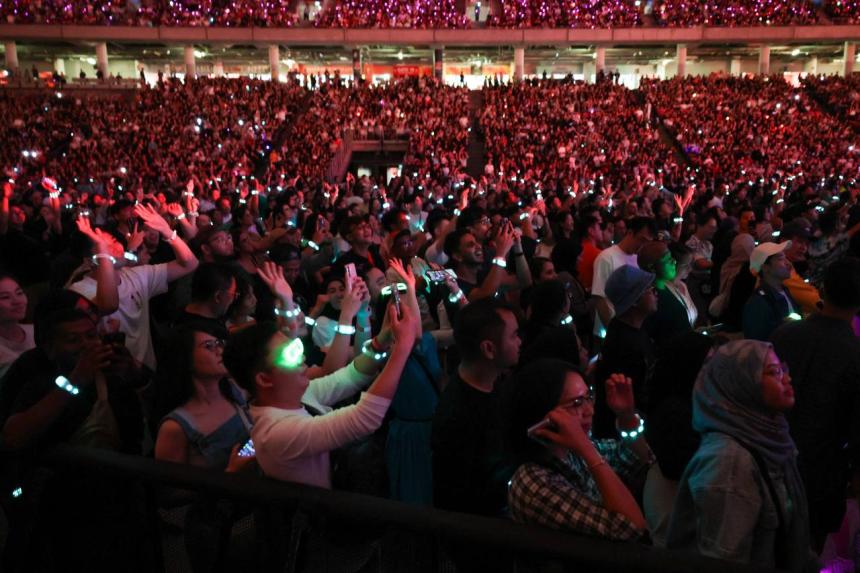 British band Coldplay light up National Stadium with kaleidoscopic ...