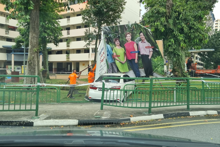 Pedestrian injured after car crashes through pavement railings in ...