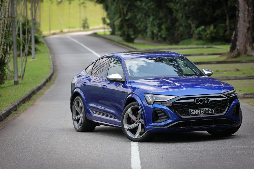 Car review: Audi spruces up early EV with more range, faster charging ...