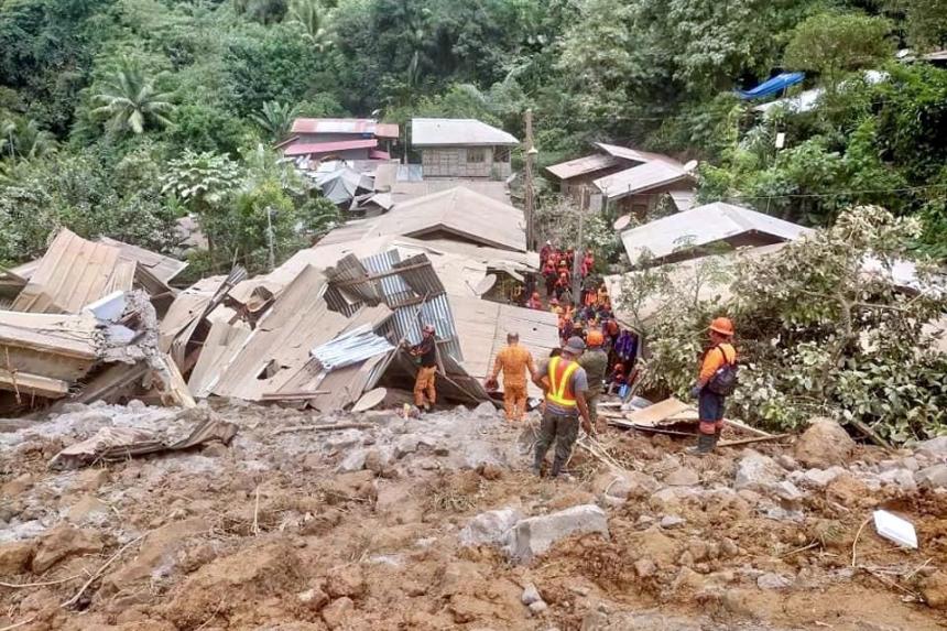 Rescuers use bare hands to search for Philippine landslide survivors | The Straits Times