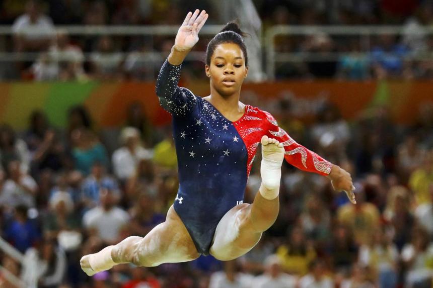 Olympic gymnastics champion Gabby Douglas delays return due to Covid-19 ...