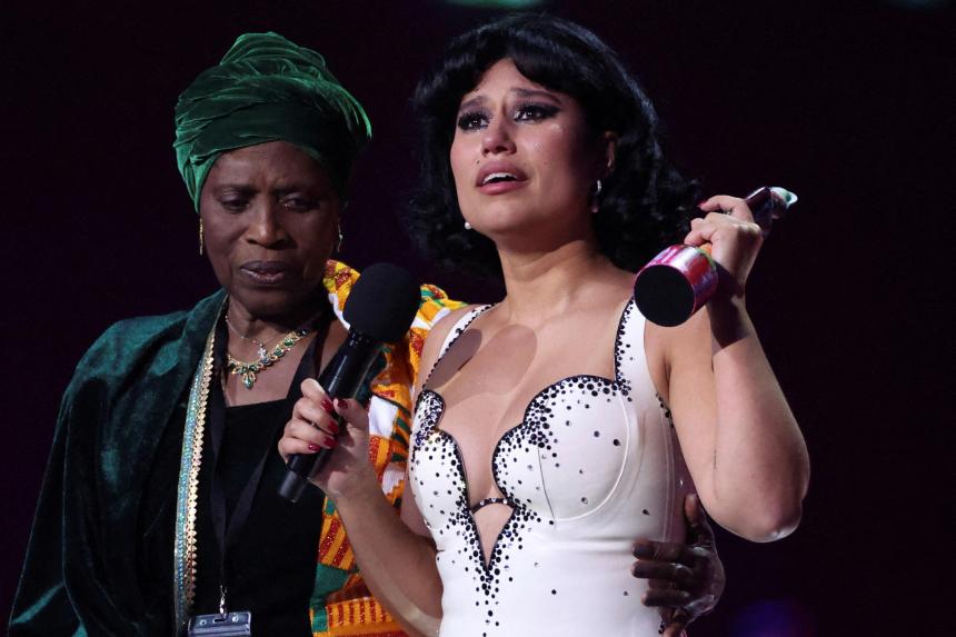 UK singer-songwriter Raye sweeps Brit Awards | The Straits Times