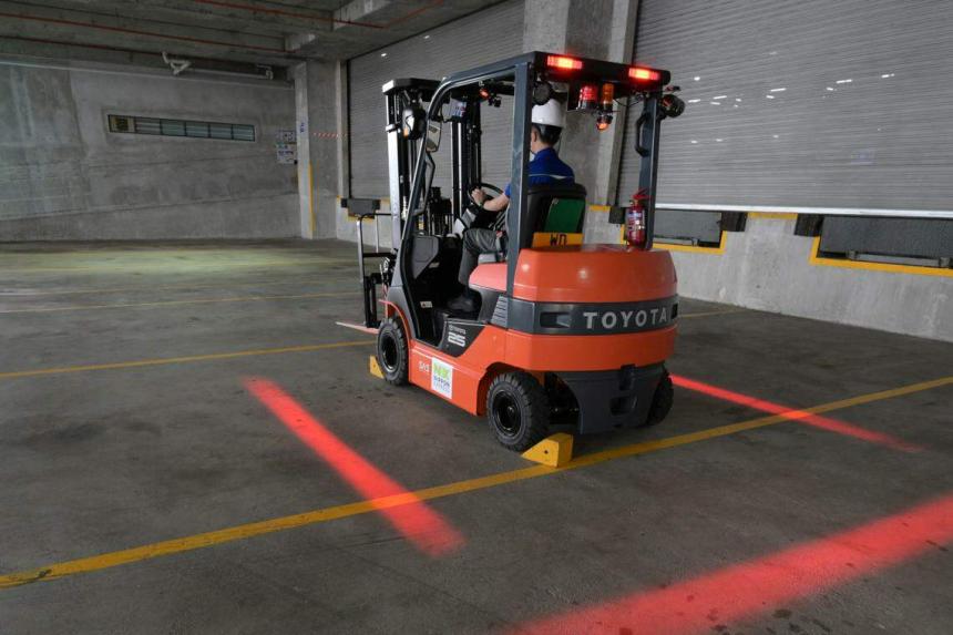 ‘No phone calls’: Logistics firm in S’pore taps AI-powered forklift to ...