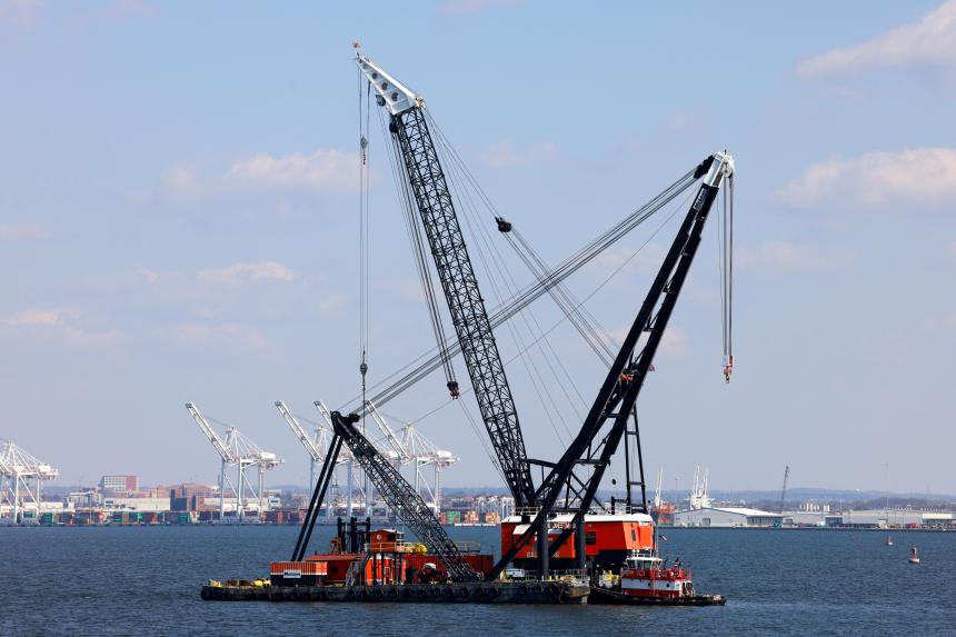 Huge crane in place to clear Baltimore bridge debris as crews assess ...