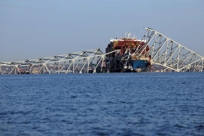 Huge crane in place to clear Baltimore bridge debris as crews assess ...