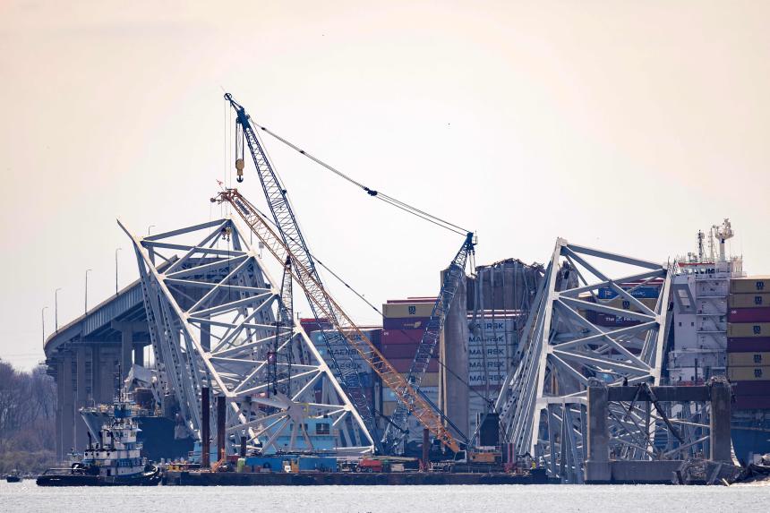 Workers remove first chunk of destroyed Baltimore bridge | The Straits ...