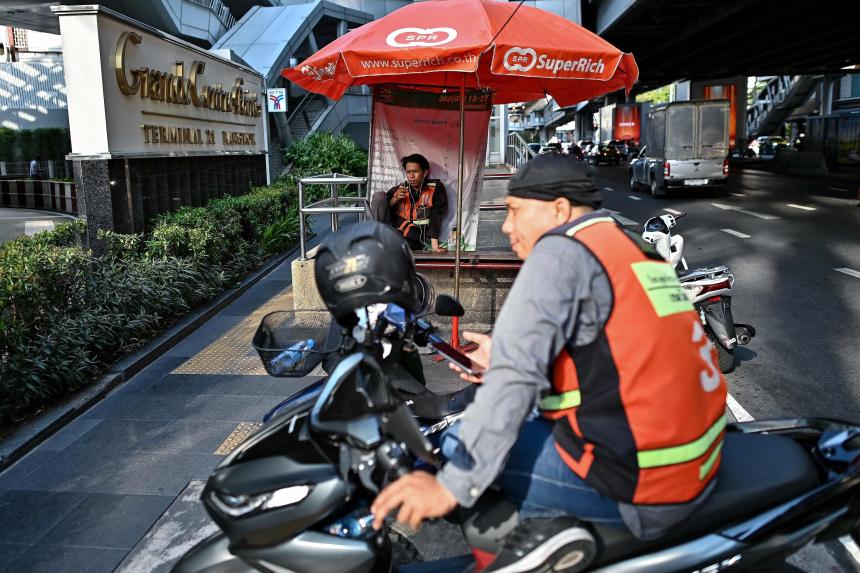 ‘Have to be outside’: Thai delivery riders swelter in heatwave | The ...