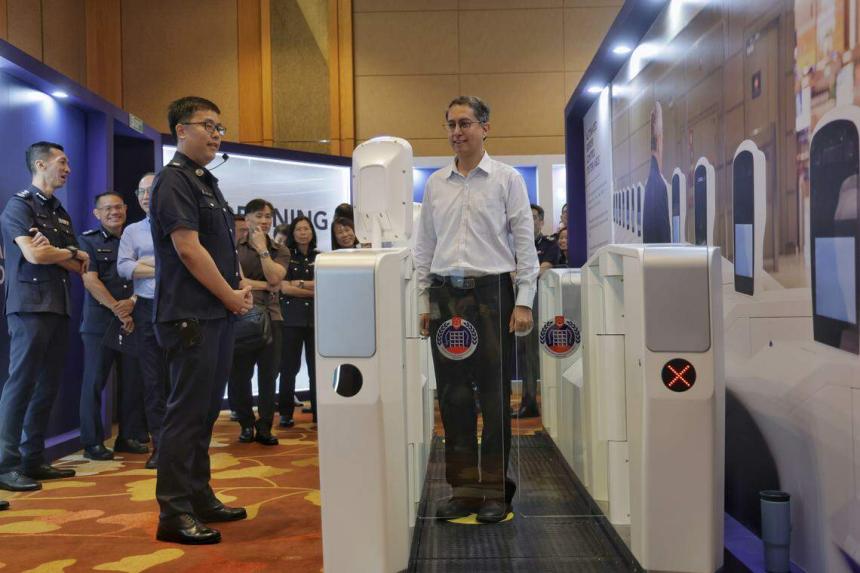 Automated immigration clearance kicks in for all Singapore visitors at ...