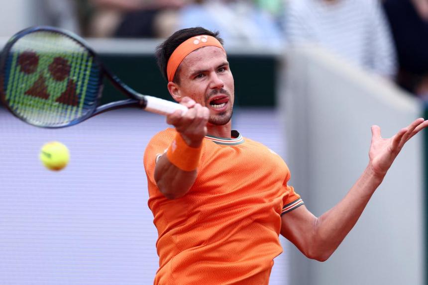 Ninth-seed Tsitsipas battles past Altmaier to reach French Open third ...