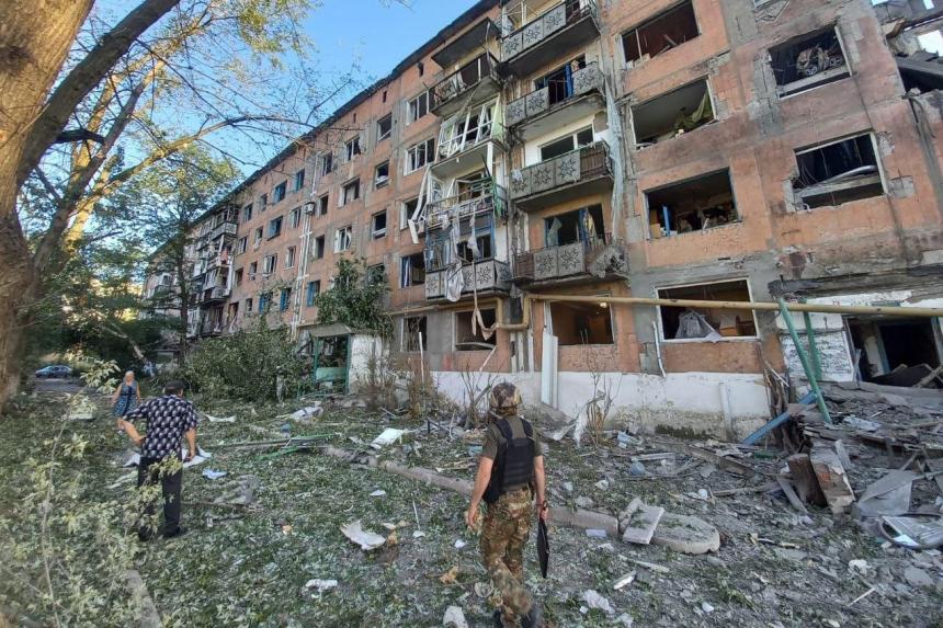 Russian bombs kill two in eastern Ukraine, say officials | The Straits ...