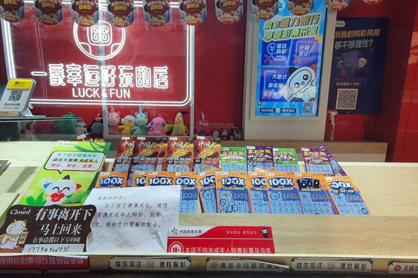 A cheap daydream: Young Chinese buy up lottery scratch cards amid ...