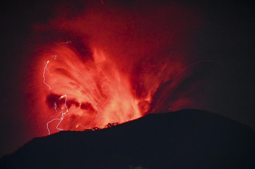 Indonesia’s Ibu volcano erupts twice, spewing red-hot lava | The ...