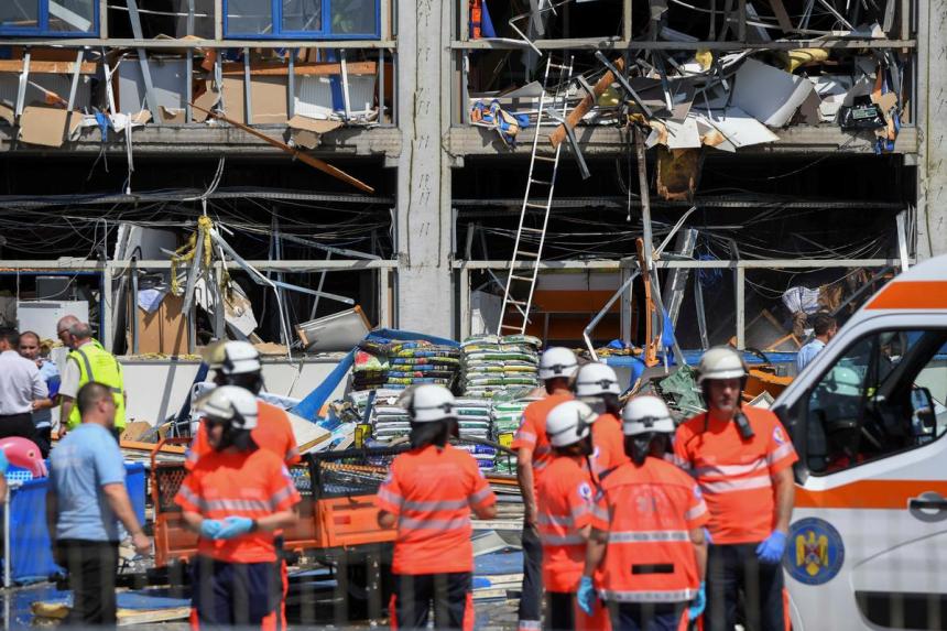 Explosion and fire injure 13 at Romanian home-improvement store | The ...