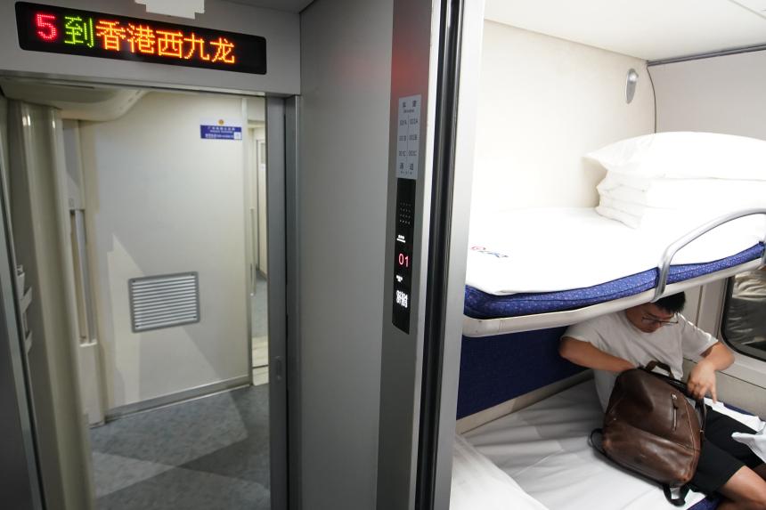 Excited Hong Kong passengers ride on new high-speed sleeper train to ...