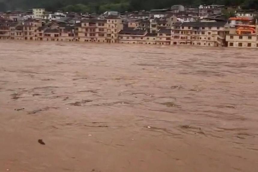 Xi calls for all-out flood rescue effort as storms pound southern China ...