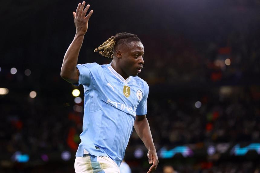 Intense Guardiola has made me better player - Doku | The Straits Times