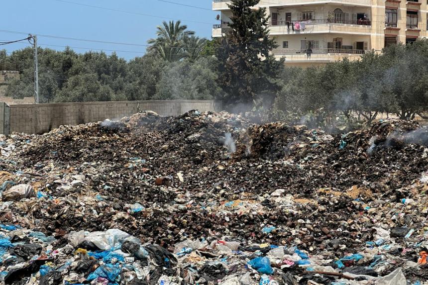 Huge mounds of rotting trash pile up around Gaza camps, UNRWA says ...