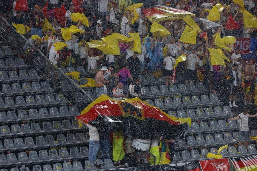 Germany v Denmark resumes after thunderstorm, hail | The Straits Times