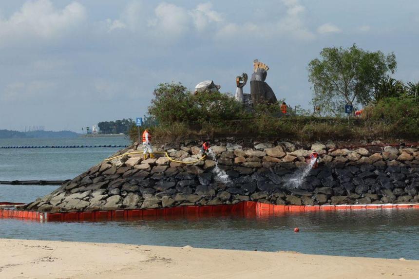 Oil spill cleanup: Rock bund cleaning on Sentosa under way, progress ...