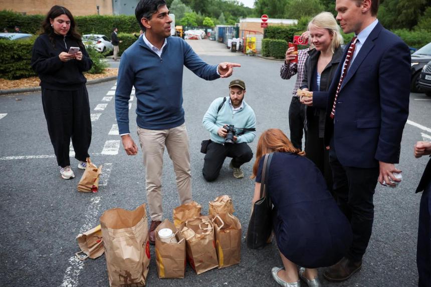 British PM Sunak hunts for votes among the robots at dawn | The Straits ...