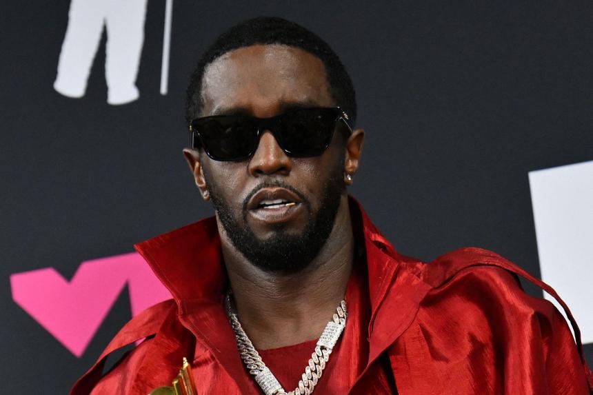 Rap mogul Sean Combs sued for sex trafficking, sex assault | The ...