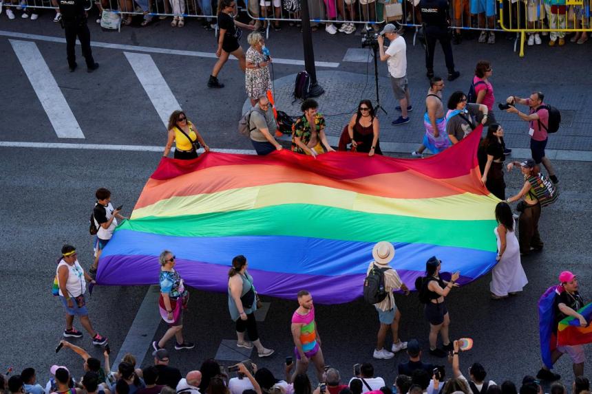 Tens of thousands fill Madrid with colour for gay pride parade | The ...