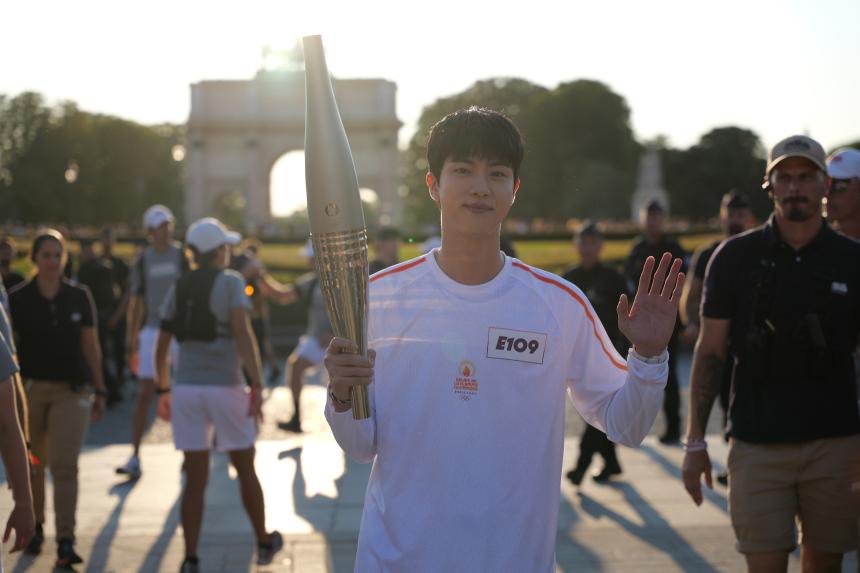 BTS singer Jin takes part in Paris Olympics torch relay | The Straits Times