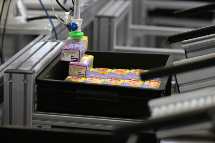 Soldiers don exoskeleton suits, operate automated packing line to ...