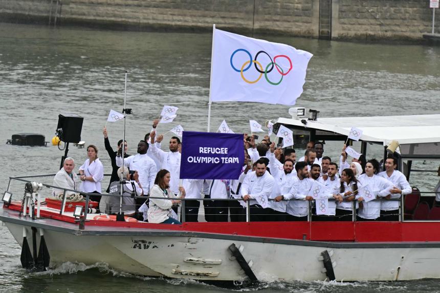 Flotilla on River Seine, rain and Celine Dion mark start of Paris ...