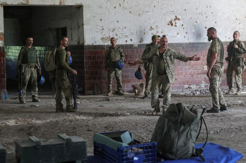 Ukrainian ex-convicts seek second chance in army service | The Straits ...