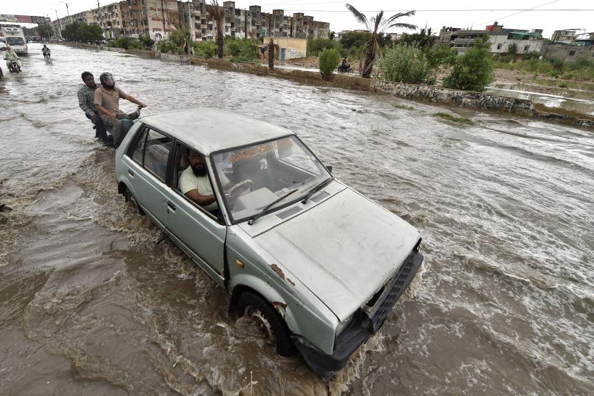Heavy rain, floods in Pakistan kill at least 30; Lahore drenched with ...