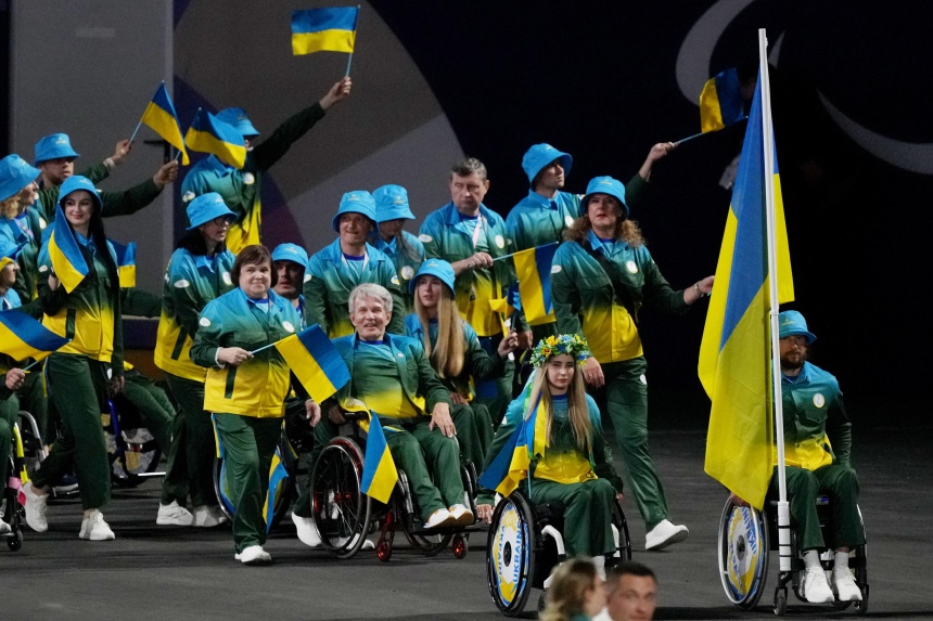 Paralympics opening ceremony lights up Paris as athletes parade along ...