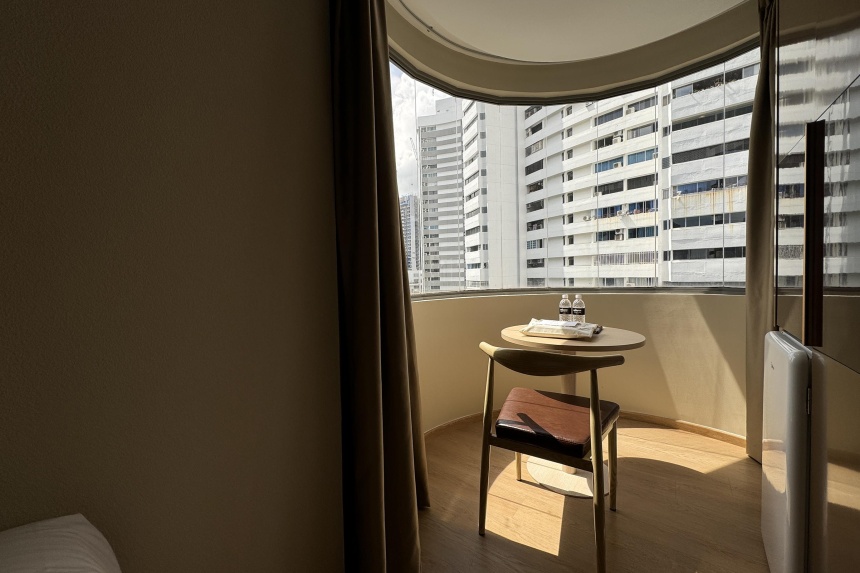 I stayed in a co-living apartment in Orchard that costs $126 a night ...