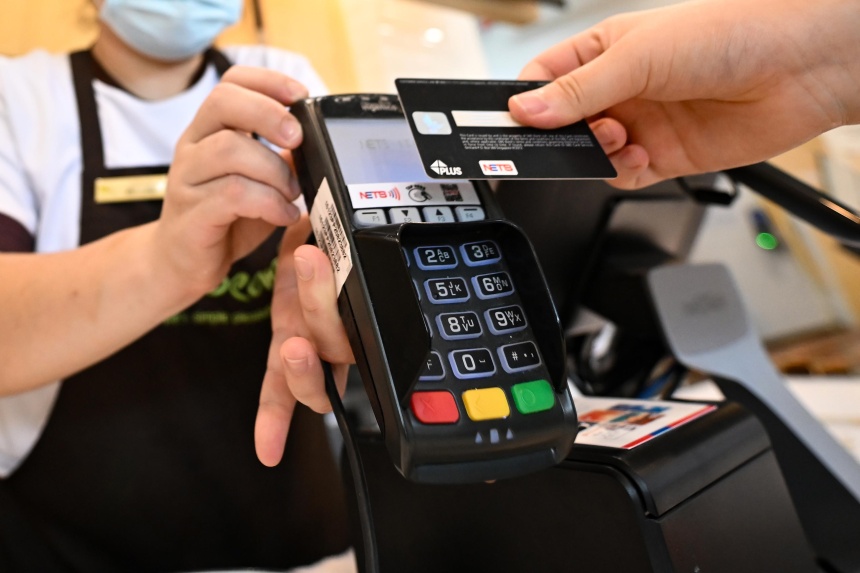 Some Nets terminals down; customers encouraged to pay cash or use SGQR ...