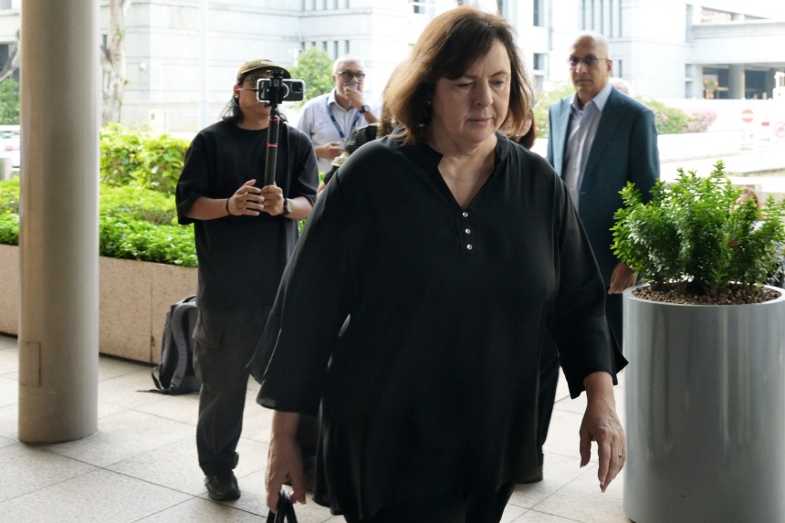 Iswaran’s wife, a prosecution witness, in public gallery a sign there ...