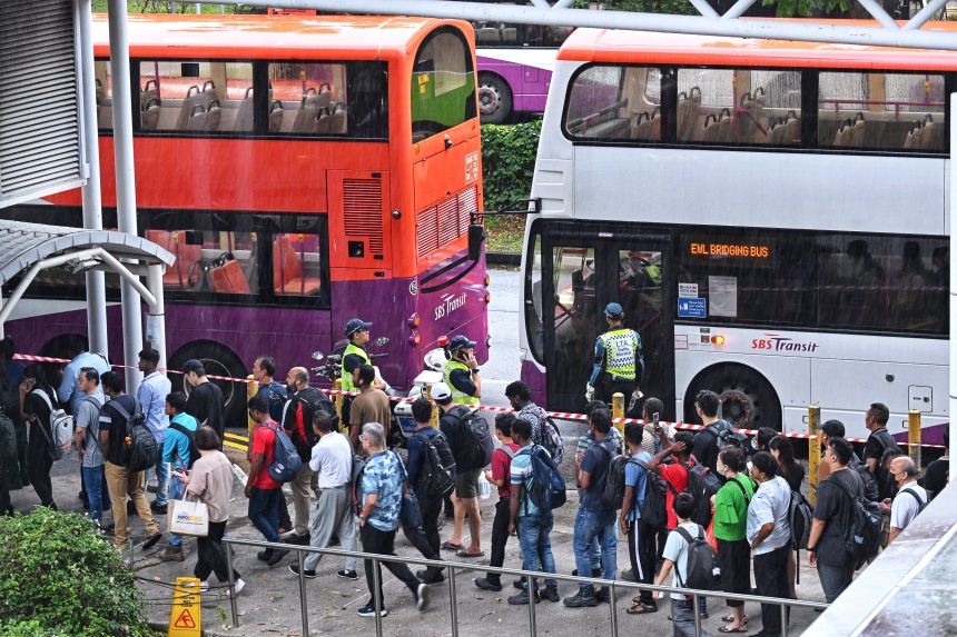 Longer travel time, snaking bus queues: EWL passengers cope with 2nd ...