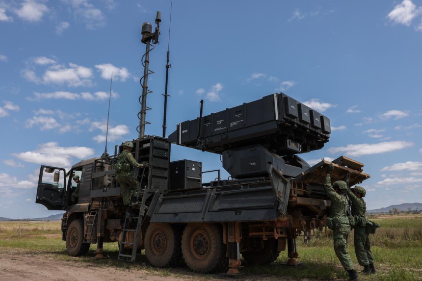 SAF soldiers, new war machines earn their stripes in Shoalwater Bay ...