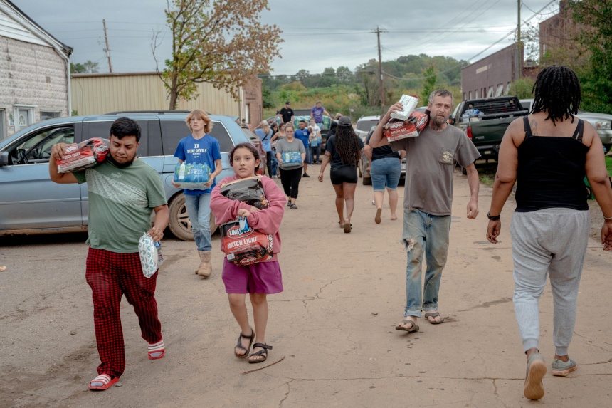 By mule and helicopter, volunteers deliver aid to victims of Hurricane ...