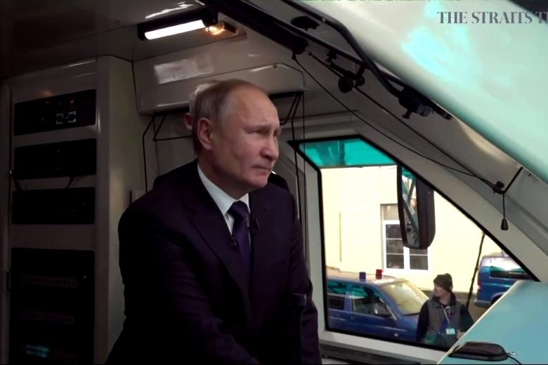 Russia's Vladimir Putin takes first train across Crimea bridge | The ...