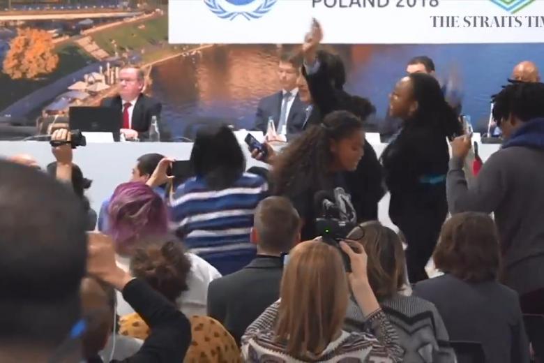 Protesters disrupt US fossil fuel event at climate talks | The Straits ...